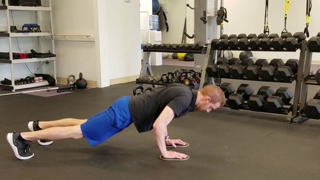 Slider push-ups with alternating reach - YouTube