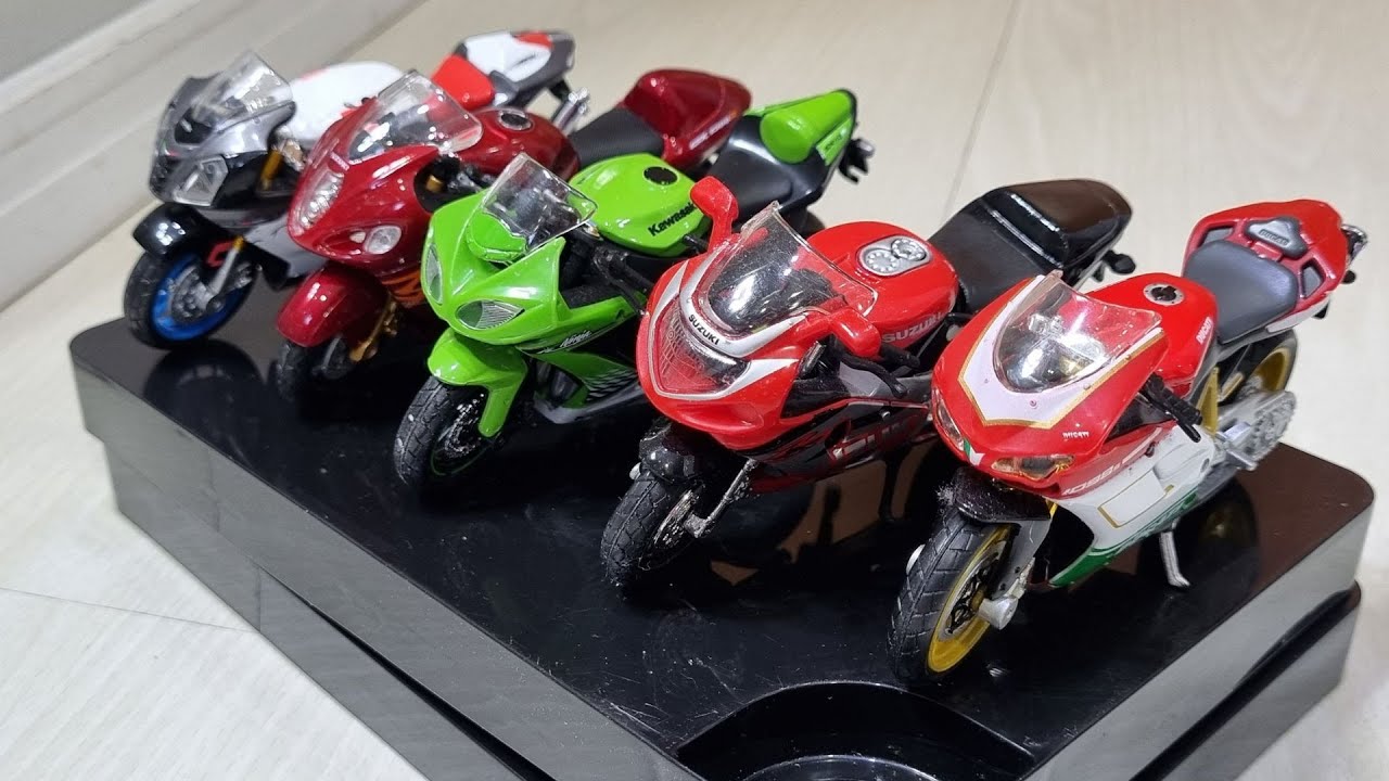 Miniature Motorcycle Models Going Up the Ramp to the Platform - YouTube