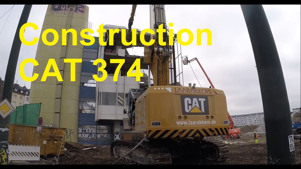 Excavator CAT 374 F UHD longfront demolition site - YouTube