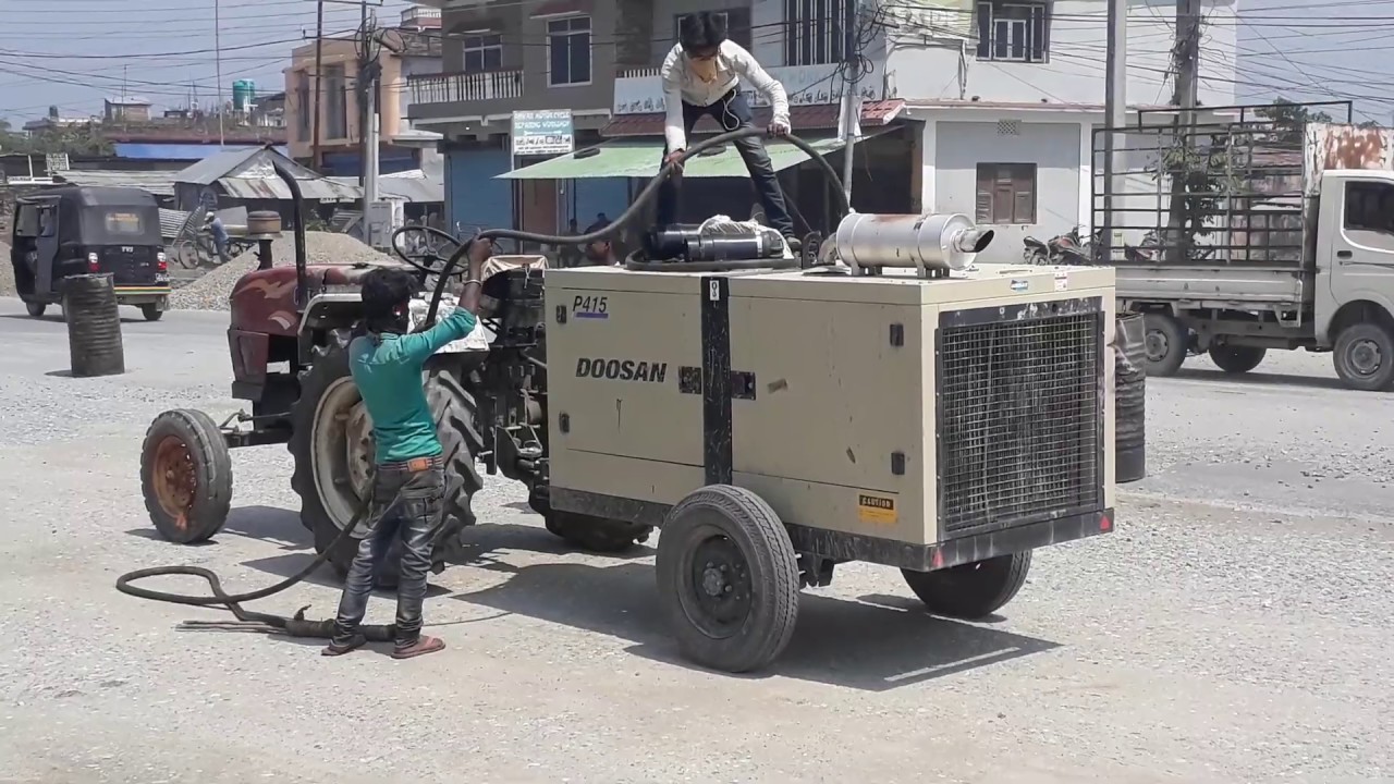 Doosan Portable Air Compressor P415 Dharan Road - YouTube