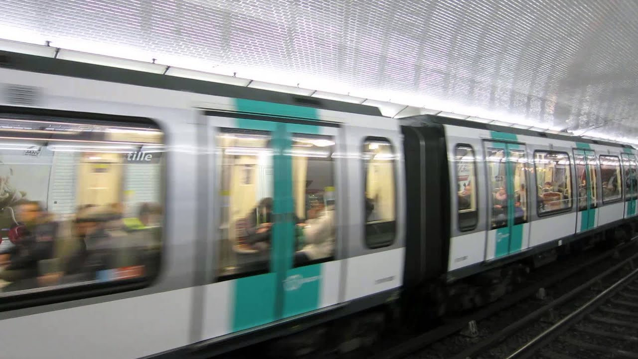 MF01 Unit 001 departing Bastille on Ligne 5 in the new RATP livery ...