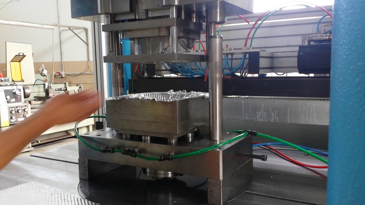 Heat shields forming in "one stroke" - YouTube