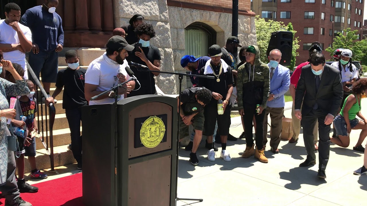 Protesters, community activists, city officials and Brockton police ...