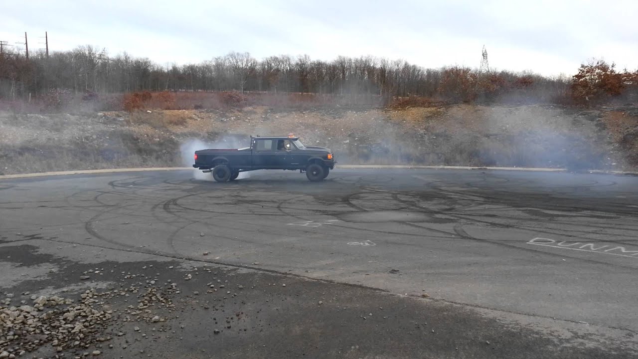 1991 F350 with DT360 doing donuts - YouTube