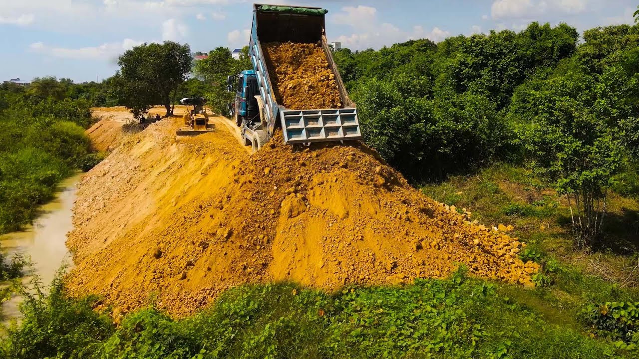 Incredible Small Dozer Komatsu Moving Dirt On Hight Cannel Construction ...