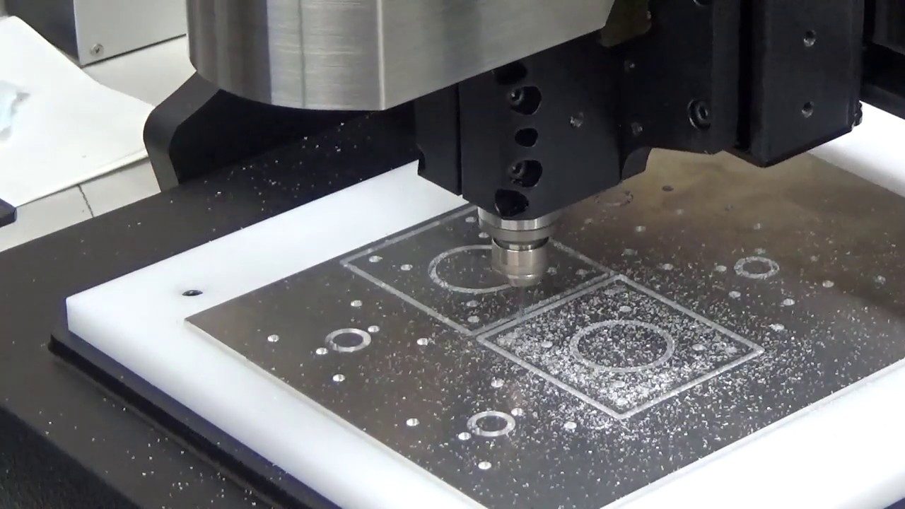 Cutting a 2-mm-thick duralumin plate by a CNC milling machine - YouTube