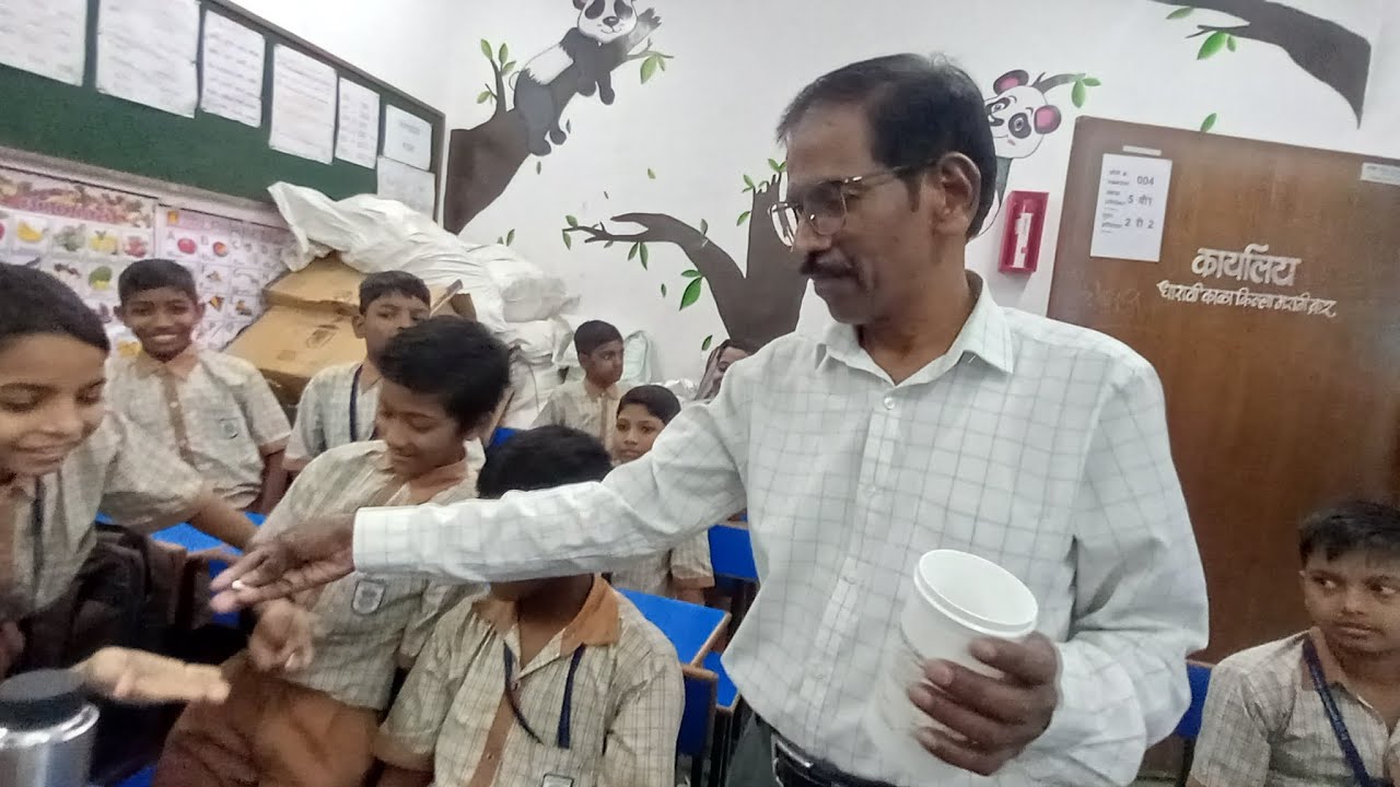 jantanashak Day Dharavi marathi school no. 2 By distributing tablets of ...