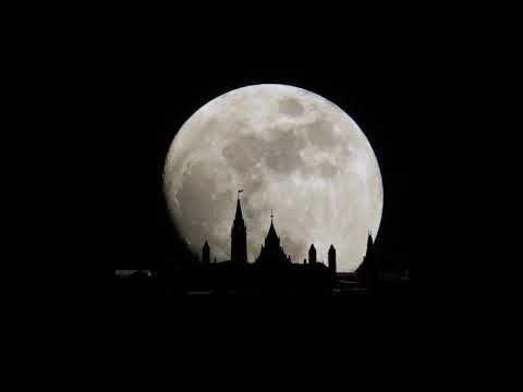 Time Lapse: Impossible Giant Full moon rising over the Parliament ...