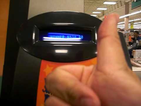 Using the 'Check a ticket' machine to scan a winning Texas Lottery Pick ...