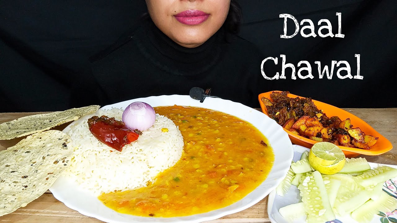 Eating Daal -Chawal with Masala Karela Fry Aloo Fry and Salad Papad ...
