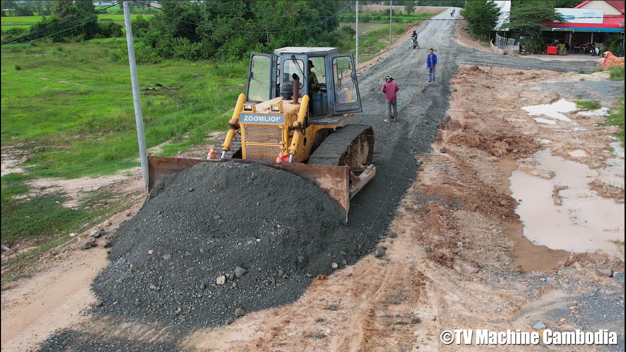 Powerful Of Specifications Dozer And Dump Truck Spreading Gravel Road ...
