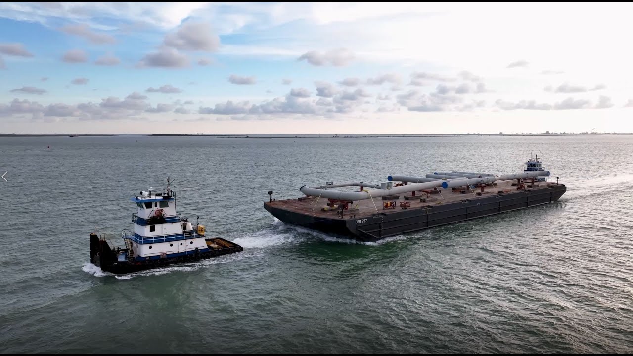 Two small Tow Boats Push and Pull a Barge down the Houston Ship Channel ...