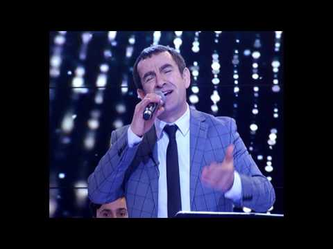 OKAY ÖZTÜRK - KAPININ ÖNÜNDE ÖNLÜK DİKİYİ
