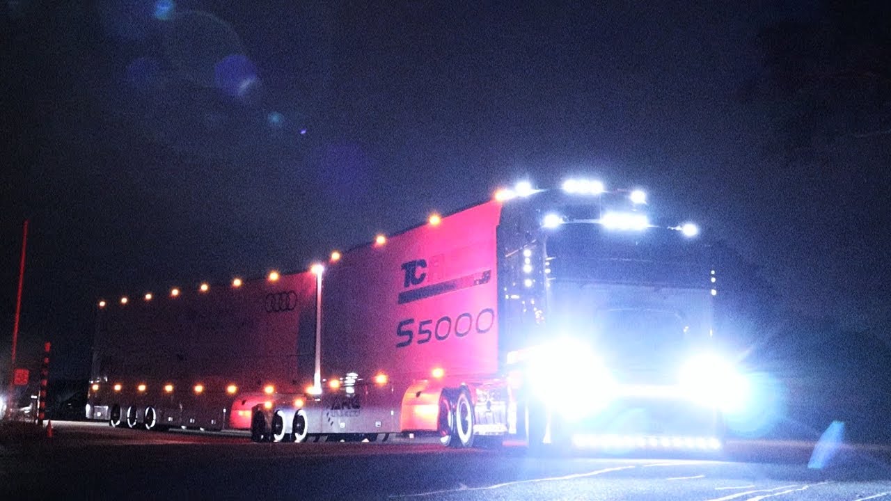 B-Double race car transporters leave Sandown in the dark - YouTube