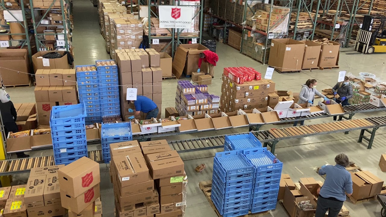 Volunteers Assemble Food Boxes - YouTube