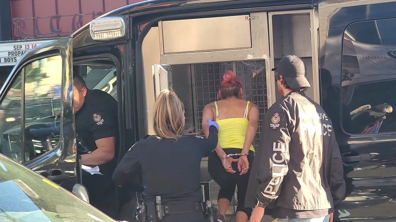 Vancouver police arrest woman, cops standing around - YouTube