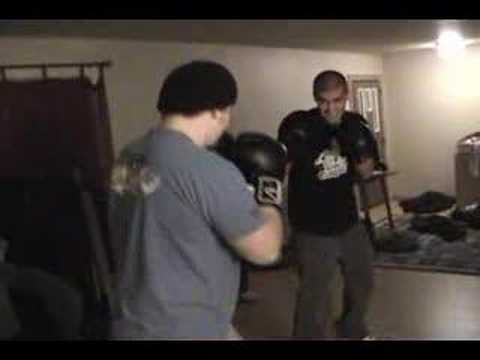 Two guys duke it out in home boxing match. Knockout at end. - YouTube