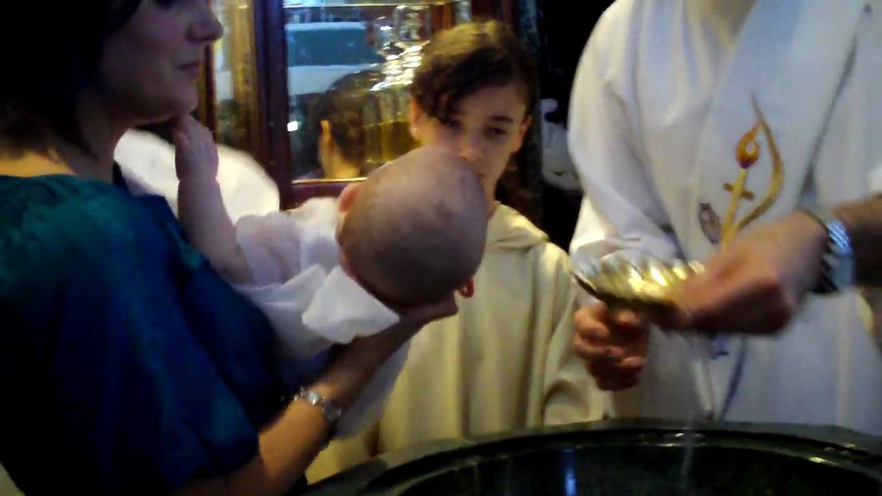 Priest Baptizing Ava - YouTube