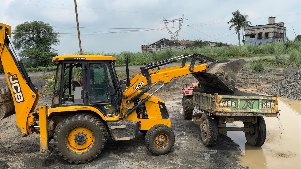 Jcb 3dx Backhoe Loader Machine Loading Dust in Two Mahindra Tractor ...