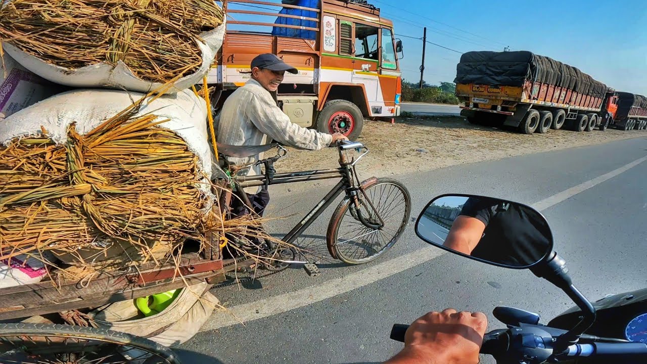 Biker Helping A Helpless Poor Trolly Puller On Road - Humanity Still ...