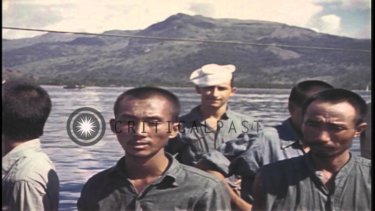 Japanese prisoners and US sailors aboard USS Capitaine underway in the ...