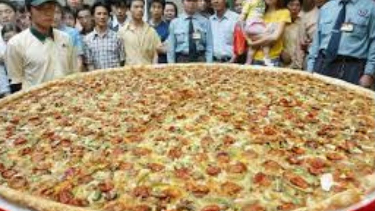 Giant pizza the biggest pizza in the world - YouTube