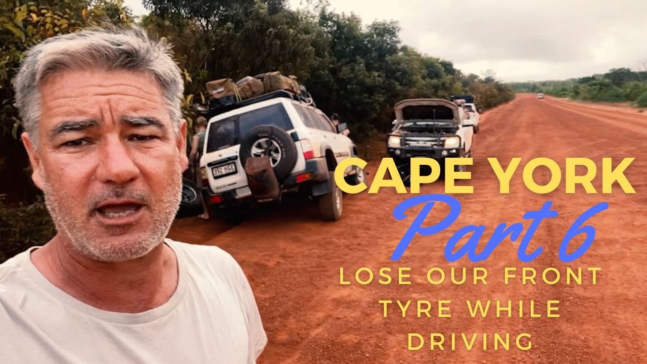 We lose our front wheel driving along the Bamaga road on our way to the ...