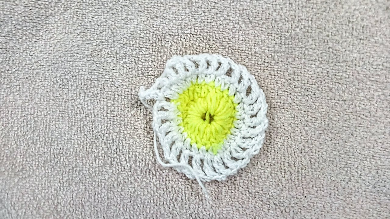 how to make a flower bun in wollen yarn 🧶 easy wollen craft - YouTube