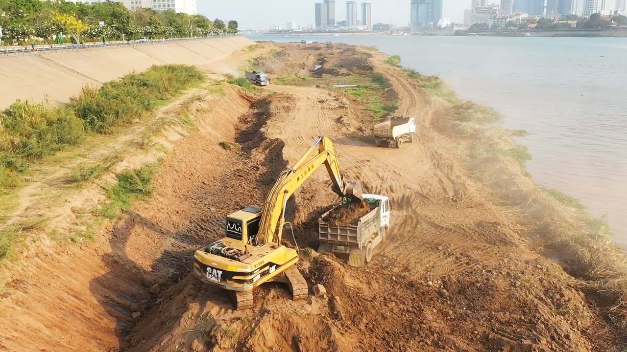 Incredible Excavator Digging Dirt and Dump Truck Unloading At Riverside ...