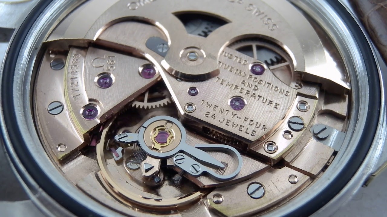 Omega constellation calendar watch movement cal.561 running. - YouTube