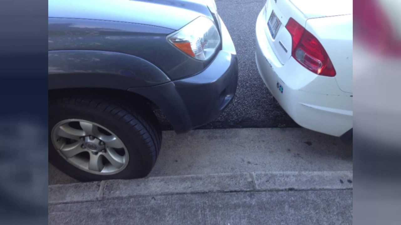 Stuck between 2 cars - YouTube