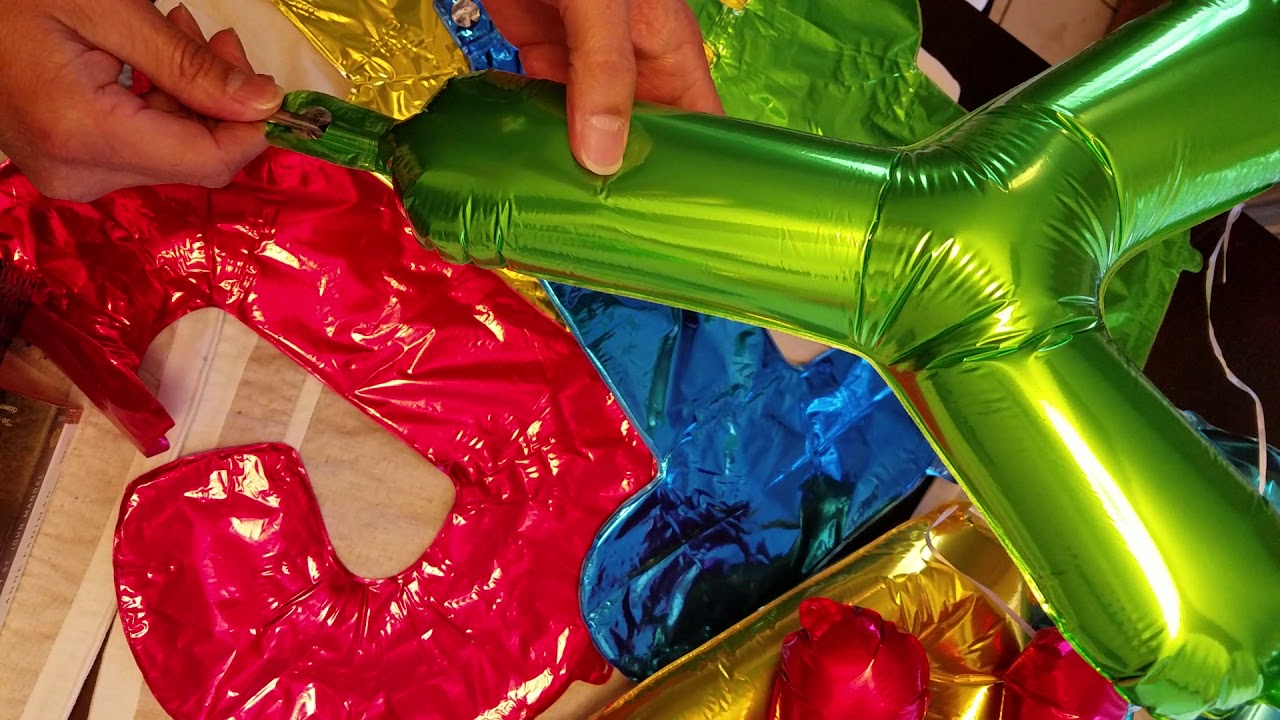Deflating a foil balloon - use a long straw - YouTube