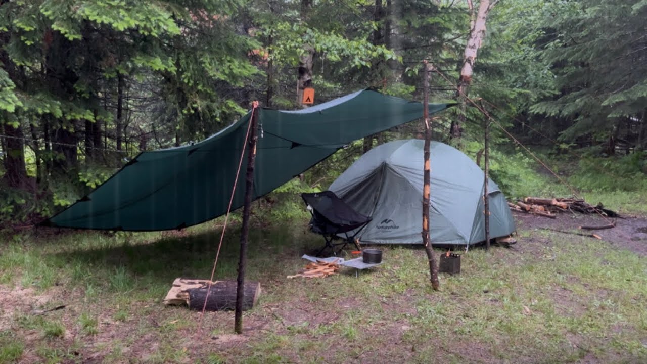 RAIN STORM - OVERNIGHT CAMPING ADVENTURE WITH FIRE ,BUGERS UNDER A TARP ...