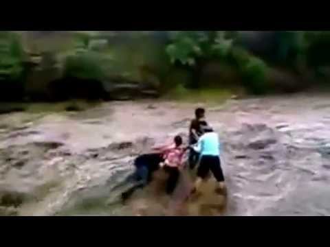 Weather Caught On Camera: Family Caught in Raging Flood