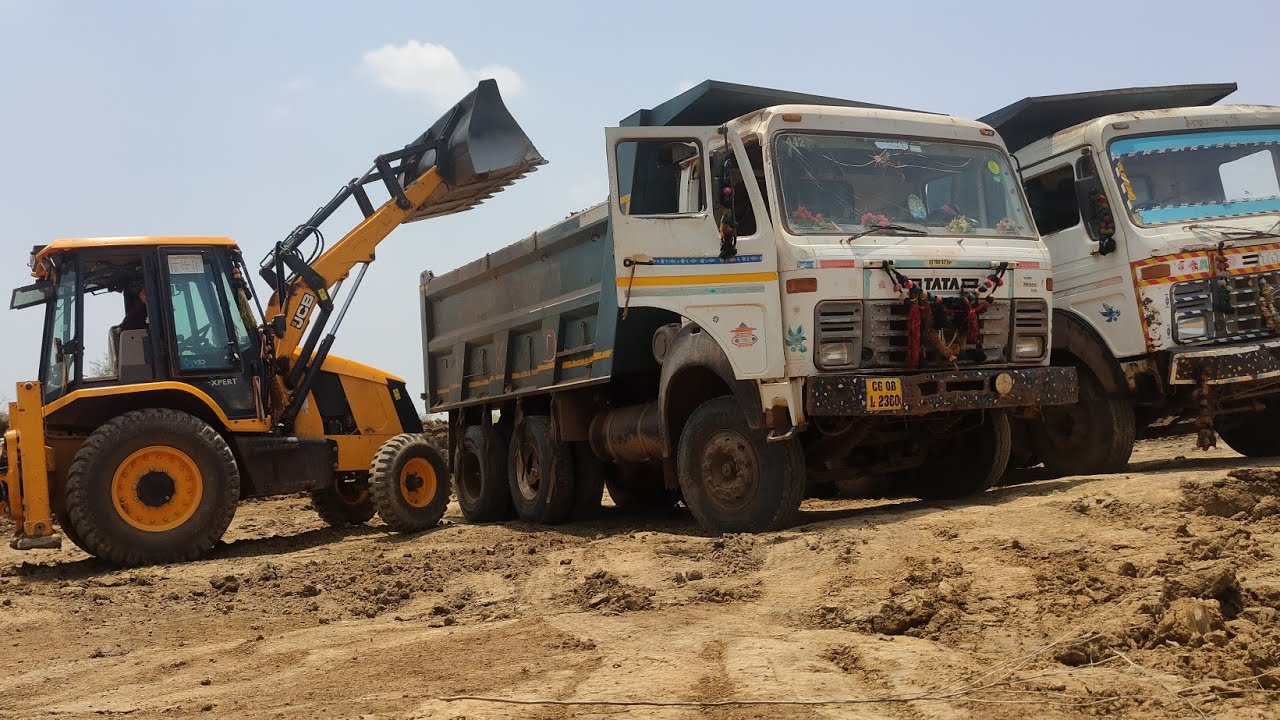 jcb backhoe loading mud in tata 2518 hayva | jcb loading mud | jcb ...