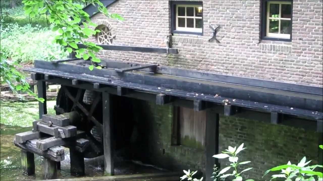 Working water wheel driven pulp mill in Holland. Old world technology ...