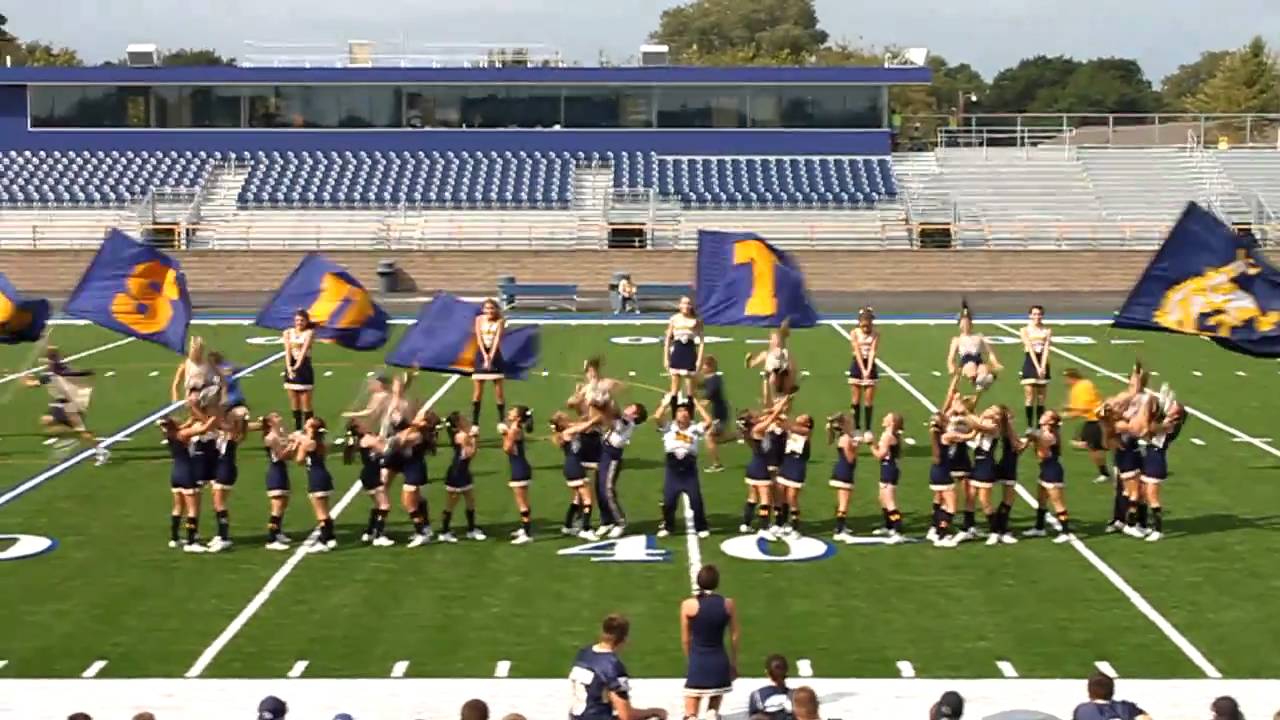 Jesuit Cheerleaders perform Ranger Day to the students - YouTube