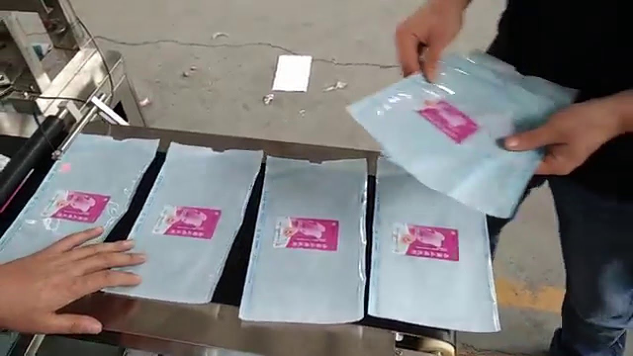 Plastic bag labeling test with paging machine - YouTube