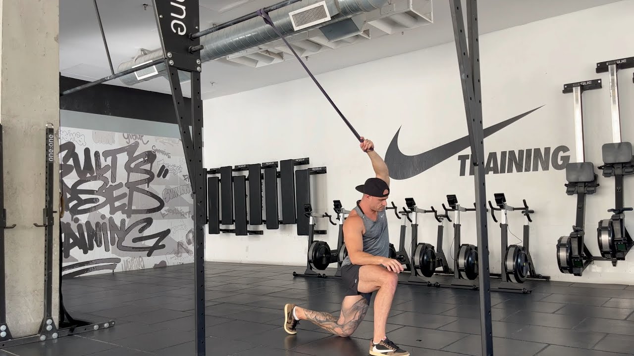 Half Kneeling Banded Lat Stretch - YouTube
