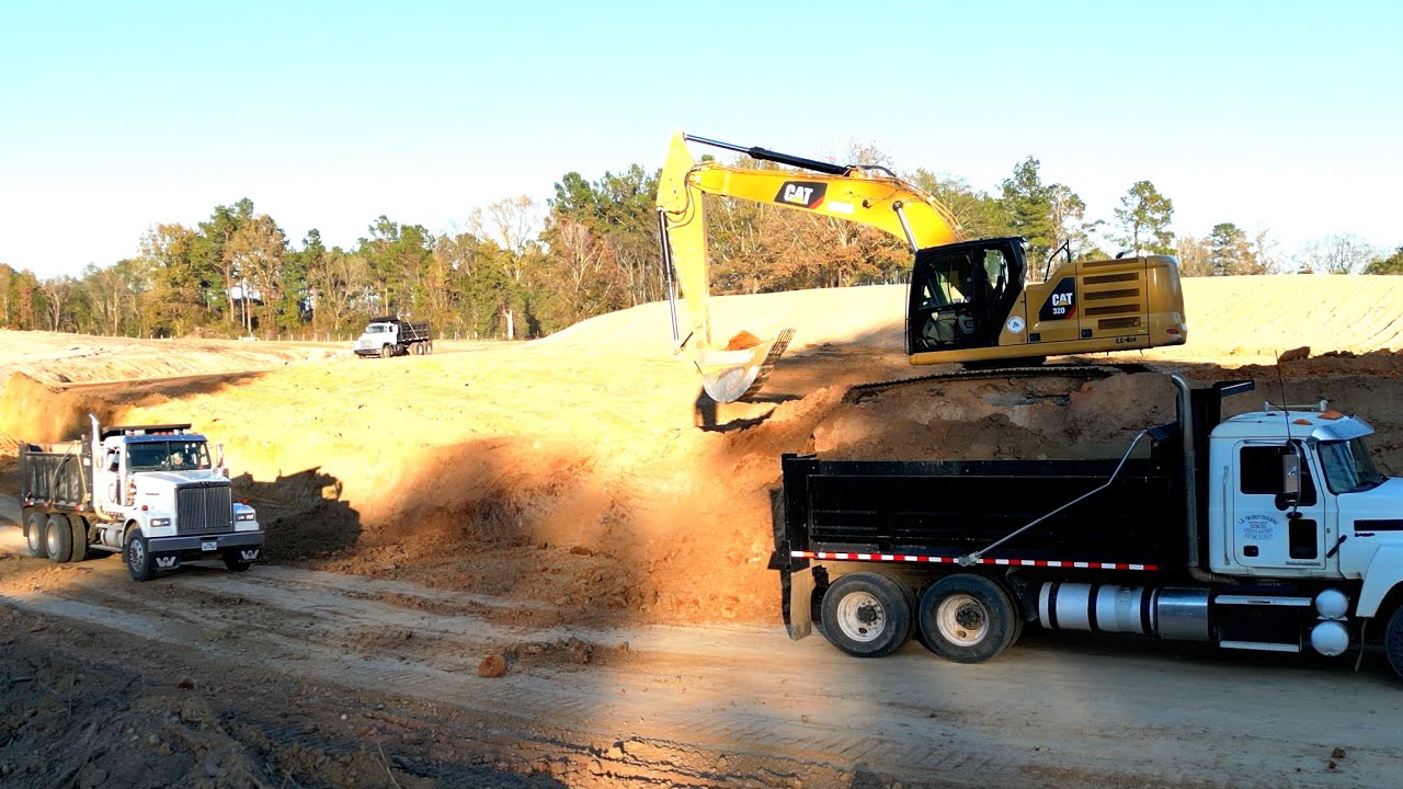 Raising the pond dam and the Deere 1810E scraper pan broke down! Can we ...
