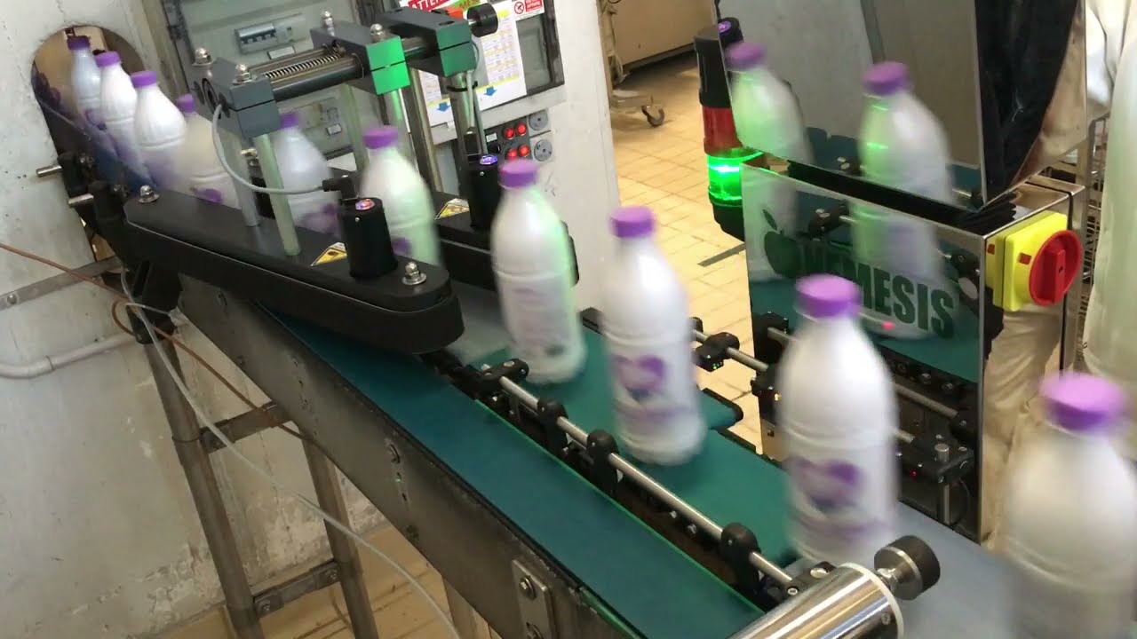 High-Speed Checkweigher - Milk Bottles 300ppm - YouTube