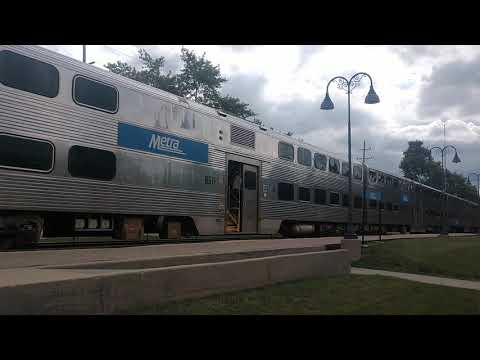 A Light Blue Outbound Metra Train meets the Inbound Metra Train both at ...