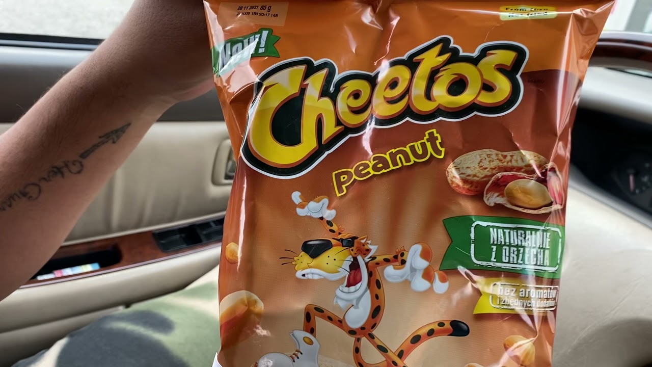 My husband trying Peanut Cheetos - YouTube