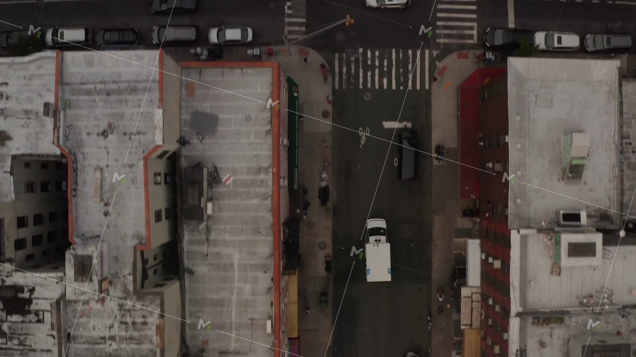 AERIAL: Overhead Top Down Birds View following an ambulance going under ...