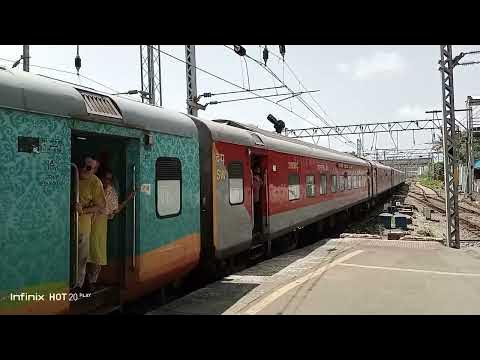 16588 Bikaner yesvantpur exp Arriving at vasai road with KJM Shed WDP4D in police bus livery ...