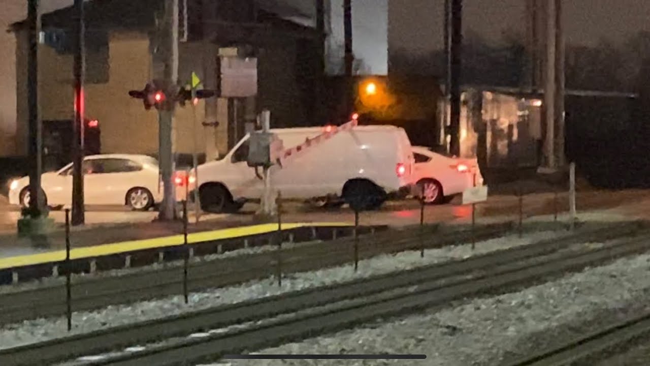 A white Van gets hit by Railroad crossing! - YouTube
