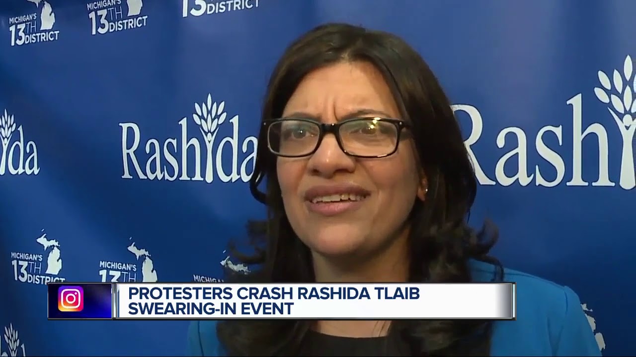 Congresswoman Rashida Tlaib faces protesters at swearing-in event in ...