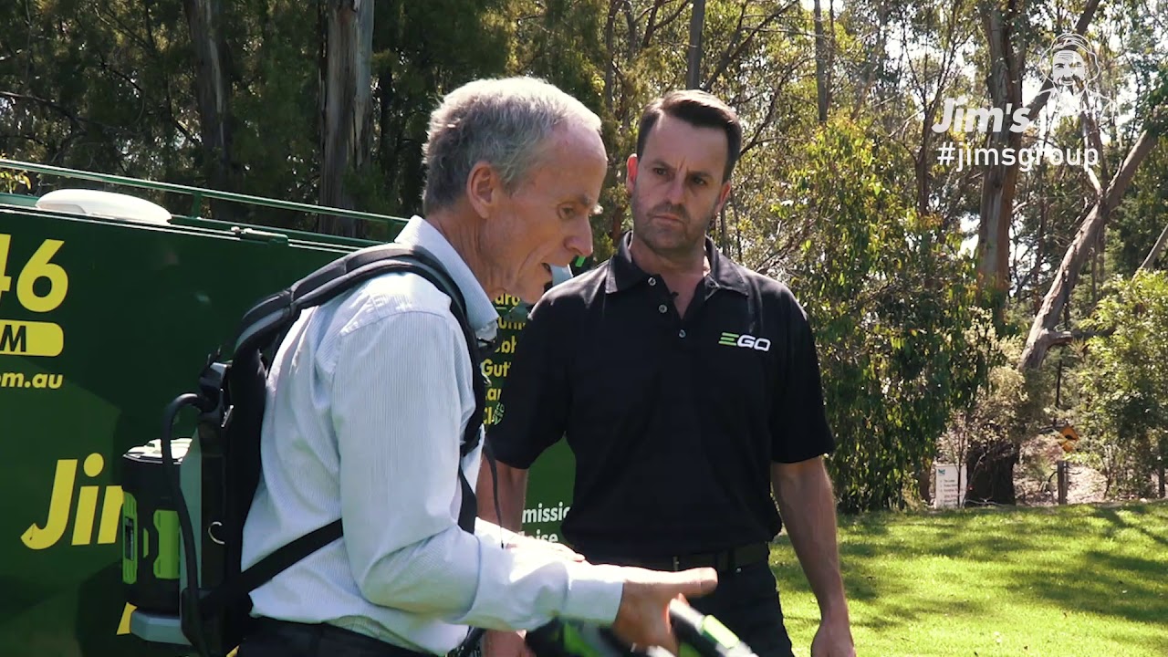 Jason from EGO shows Jim, the founder and CEO of Jim's Mowing some of ...