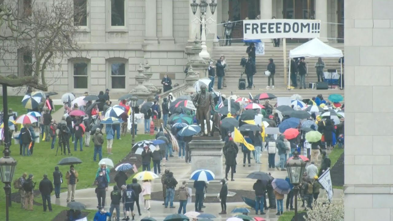 People gather outside Michigan State Capitol for anti-lockdown protest ...