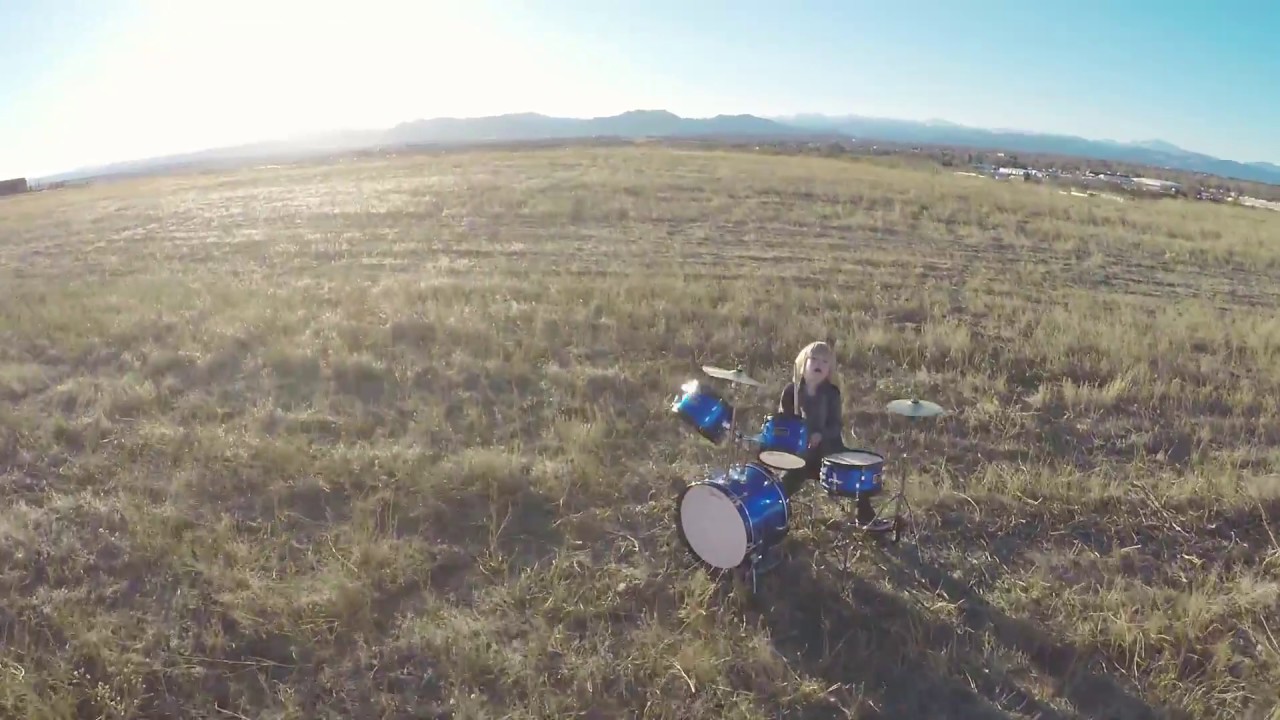 Drumming in the field - YouTube